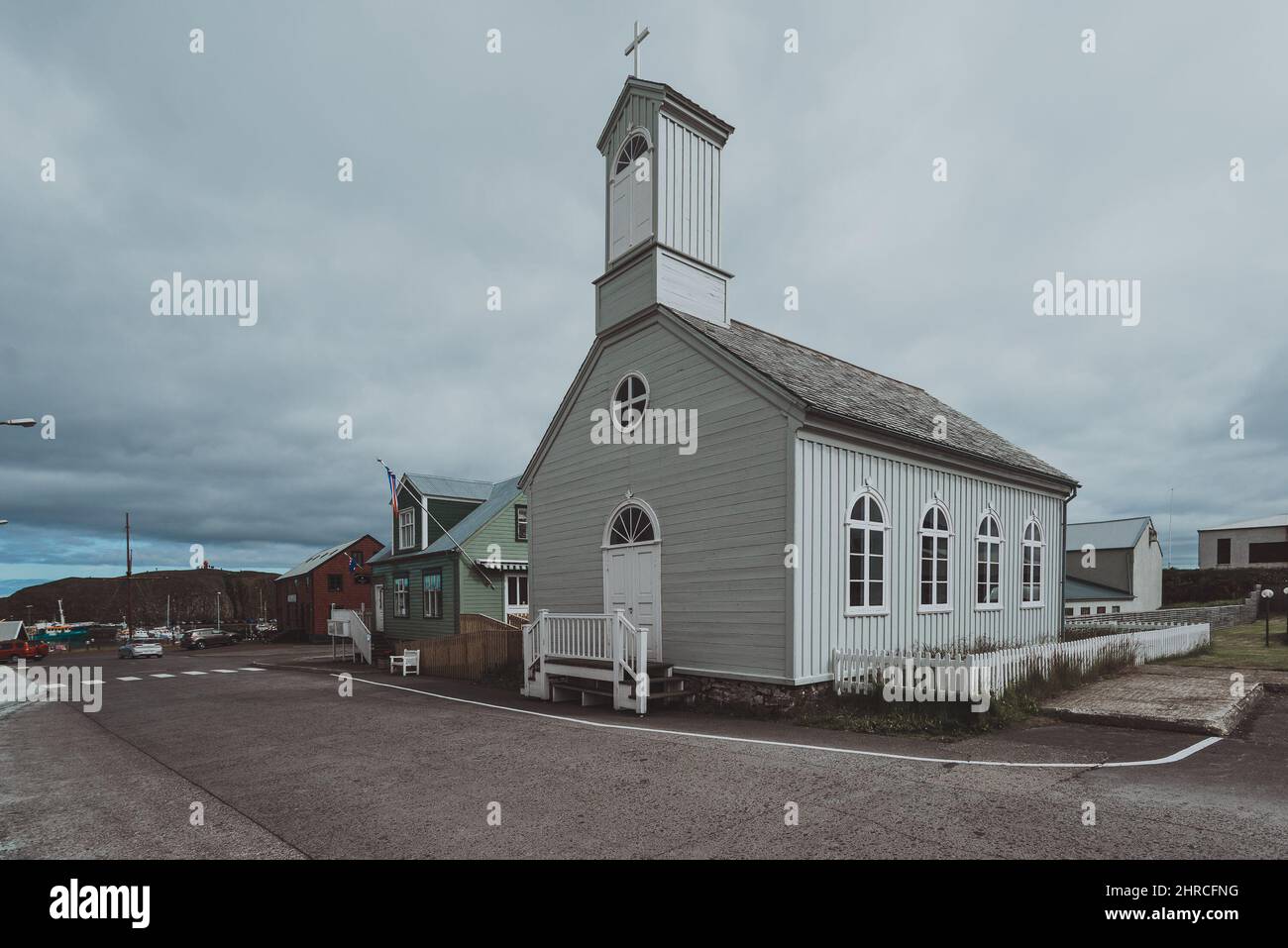 Small wooden church with white walls and a grey roof in a gloomy ...