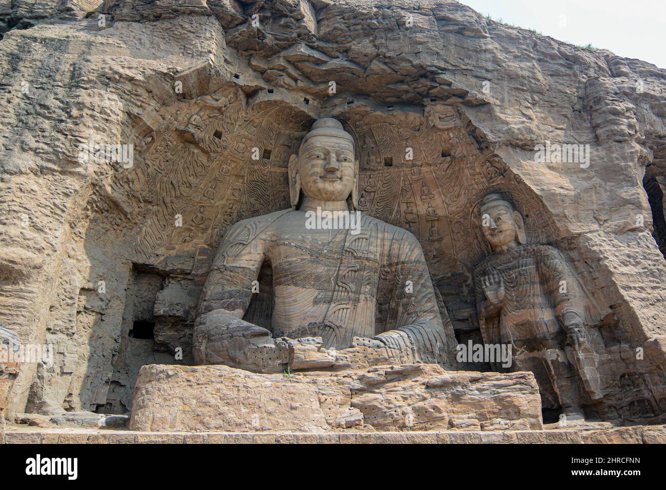 Buddha statues in the Chinese Yungang Grottoes temple of Datong City ...