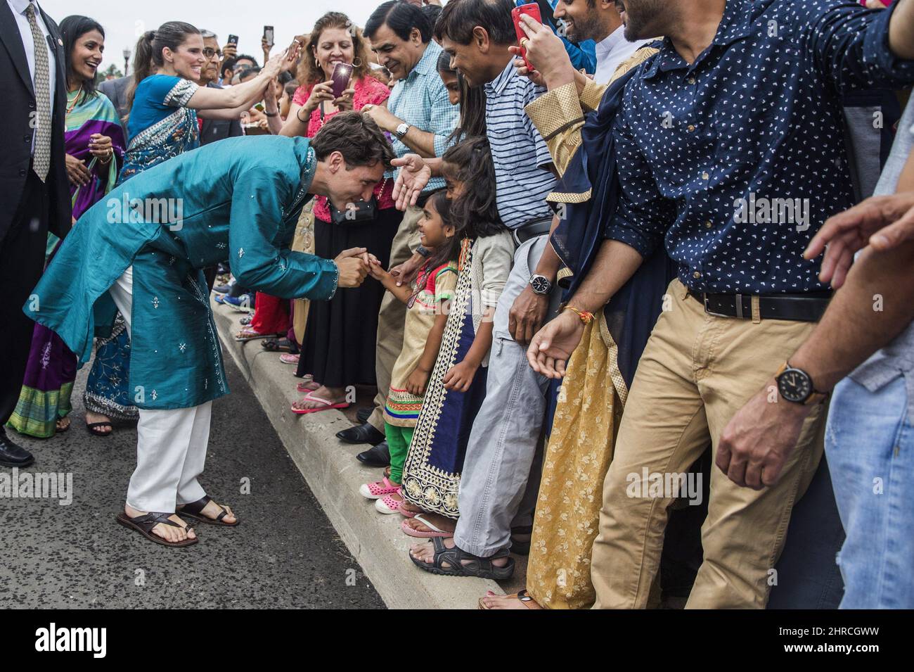 Prime Minister Justin Trudeau greets people as he visits the BAPS Shri ...