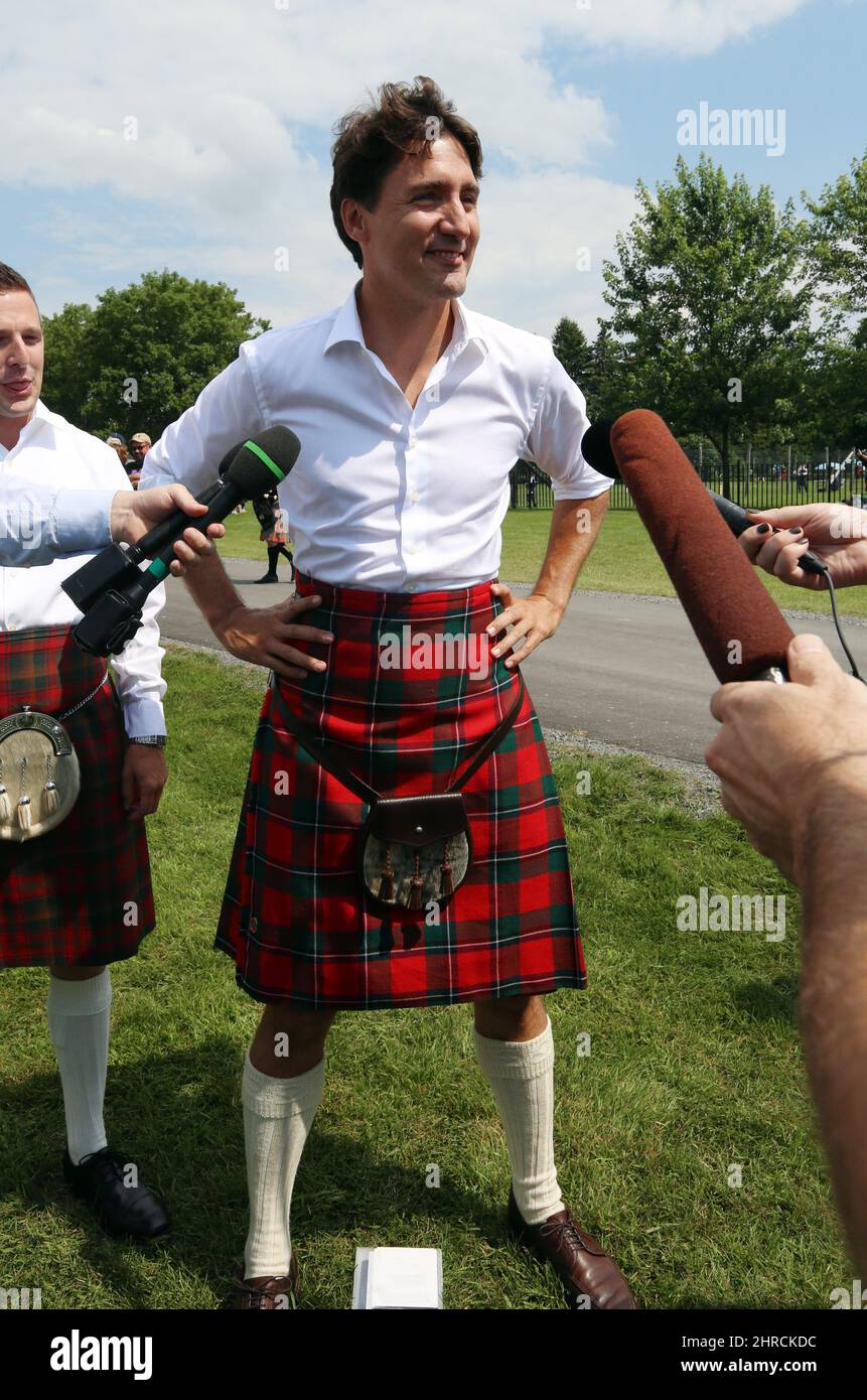 Prime Minister Justin Trudeau wearing kilt, talks to reporters while ...