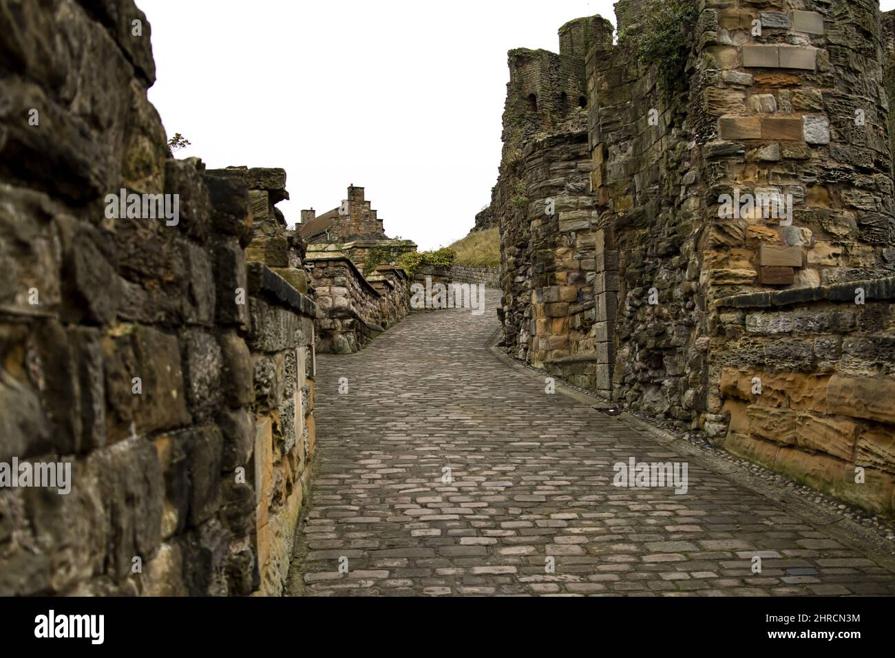 Brick path with stone walls to Scarborough Castle Stock Photo - Alamy