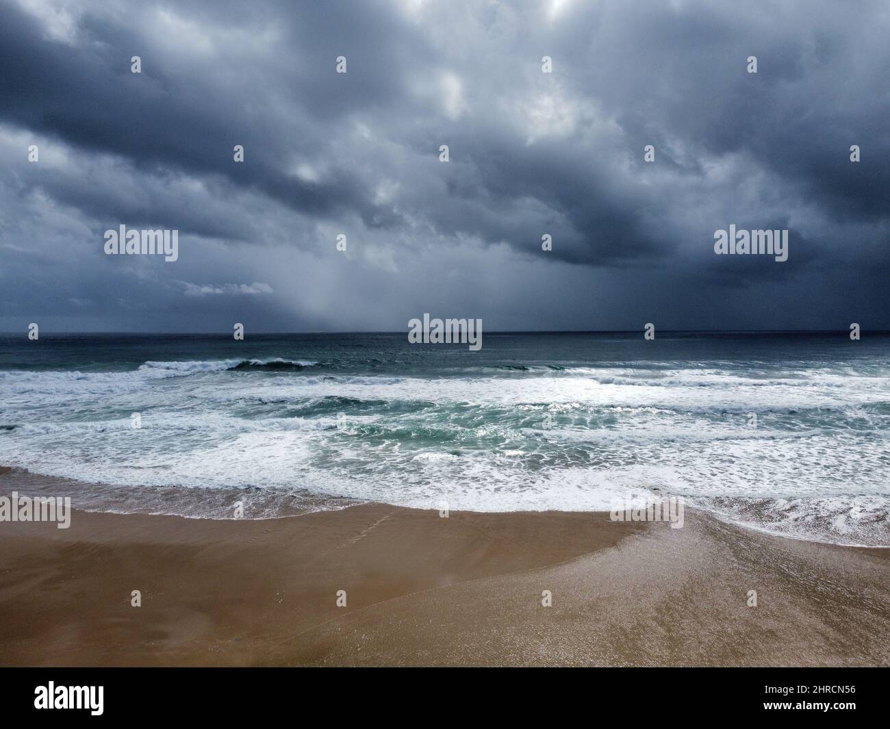 Natural view of strong waves at the shores under a gloomy sky Stock ...