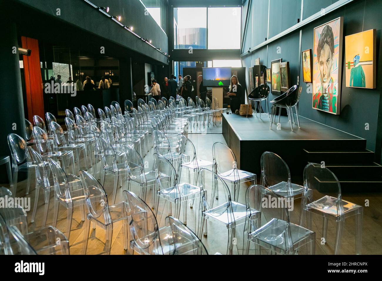 Closeup shot of empty chairs for the upcoming talk in an art gallery ...