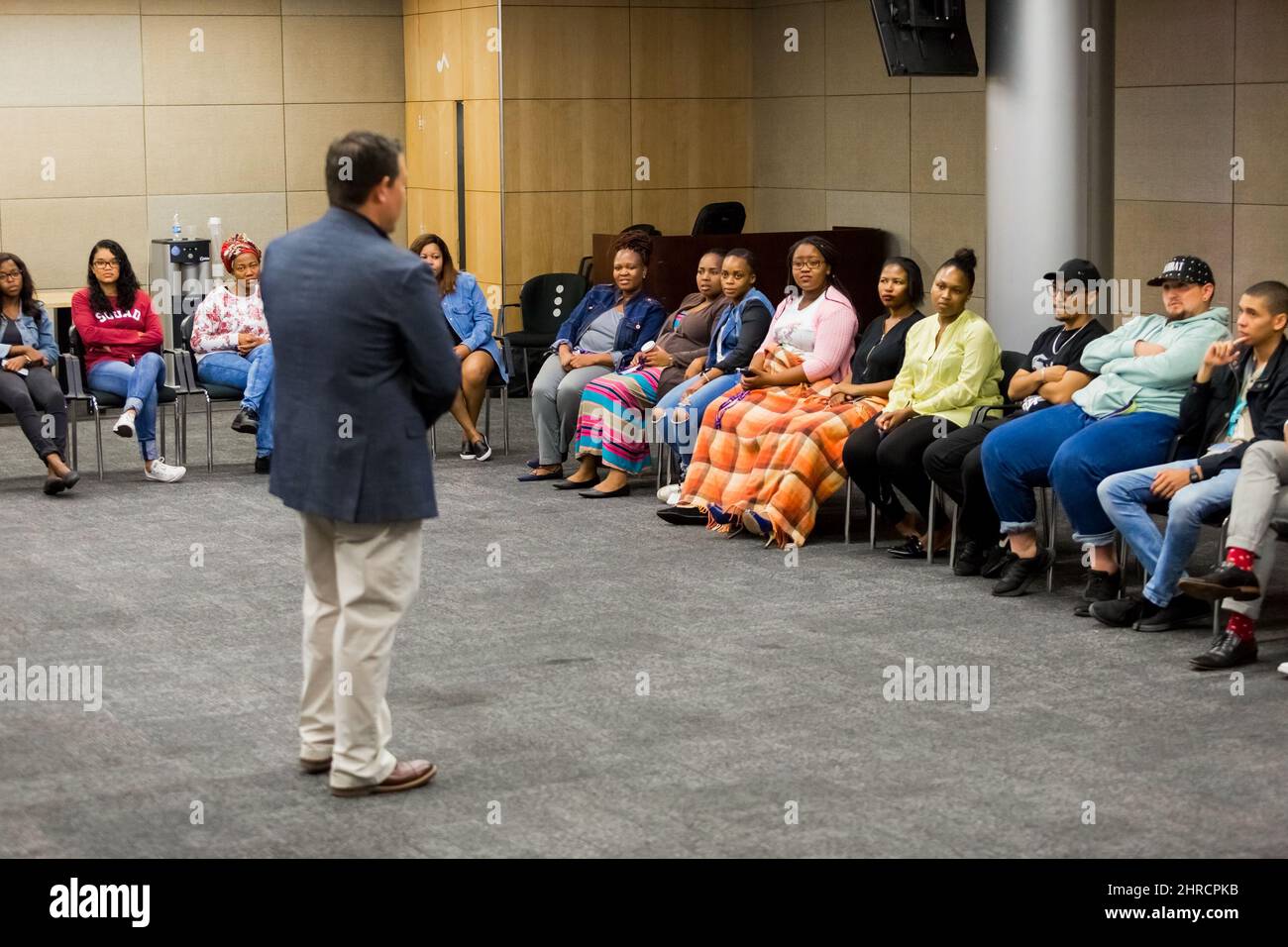 Auditorium of adult students attending a class on finance Stock Photo ...