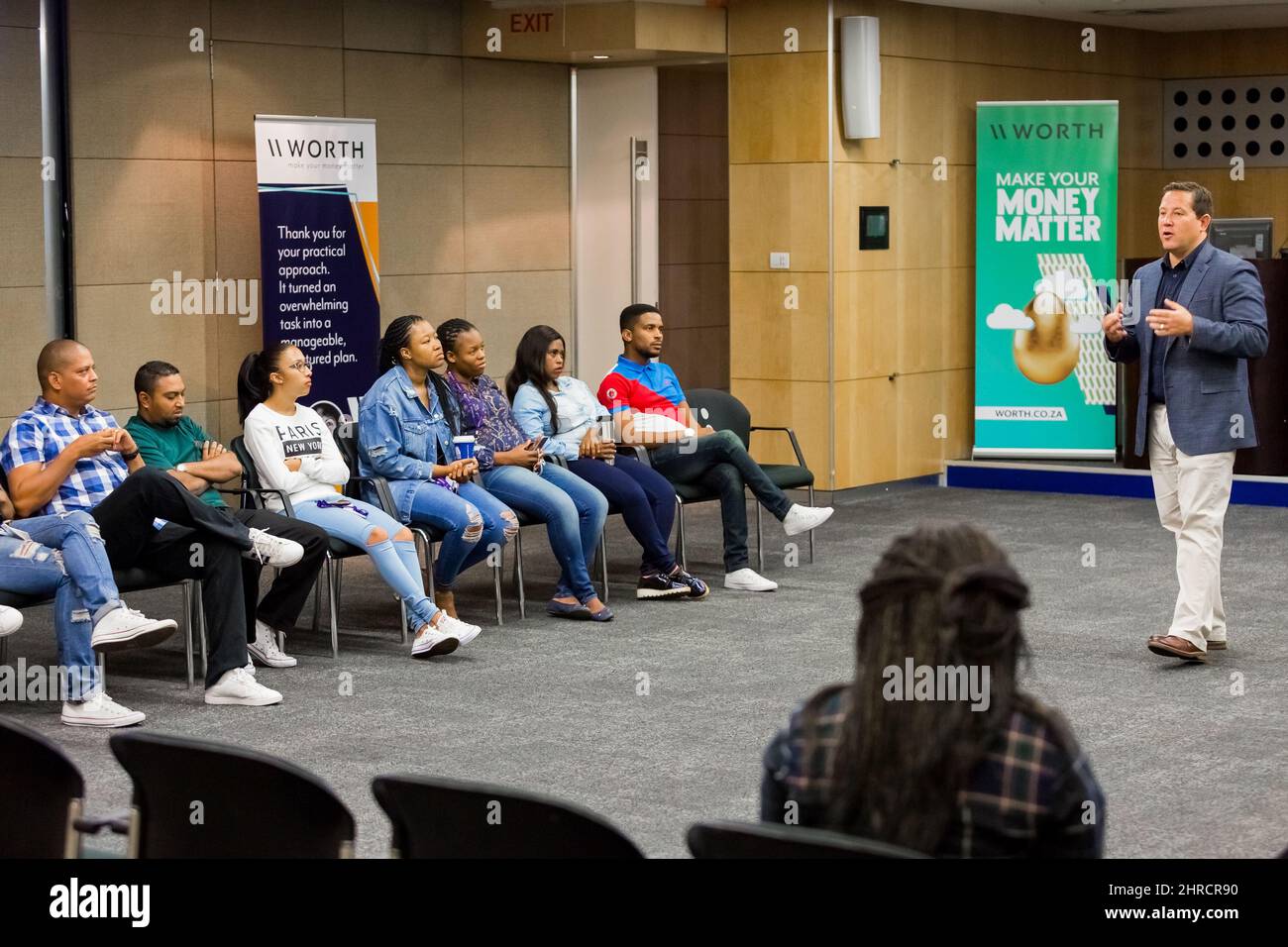 Auditorium of adult students attending a class on finance Stock Photo ...