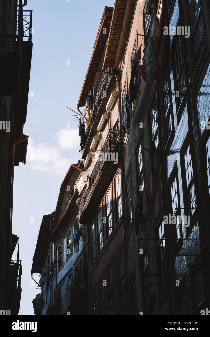 Vertical low angle shot of glass windows on an apartment building Stock ...