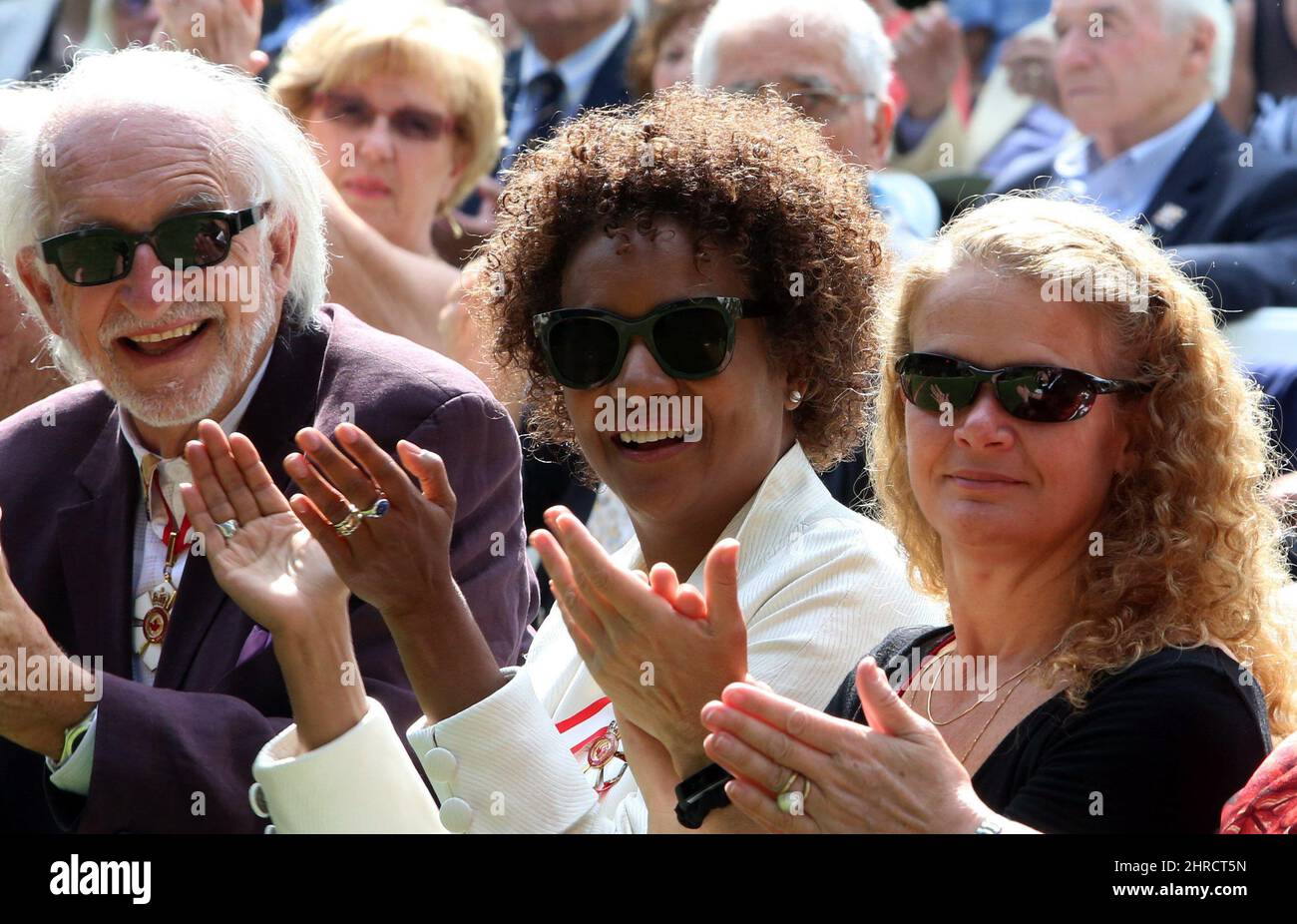 Former governor general Michaelle Jean, centre, and her husband Jean ...