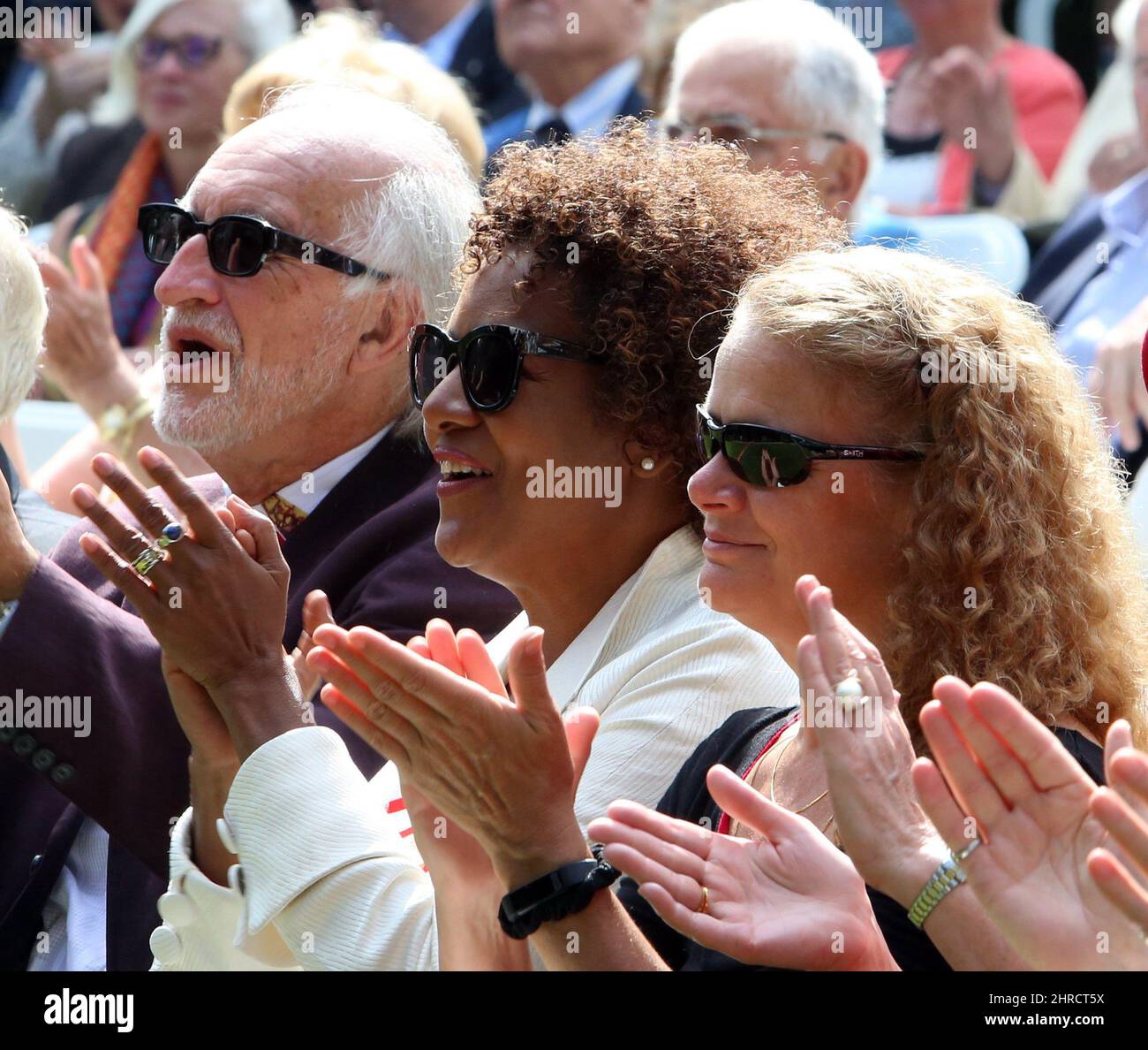 Former governor general Michaelle Jean, centre, and her husband Jean-Daniel Lafond, left, along ...