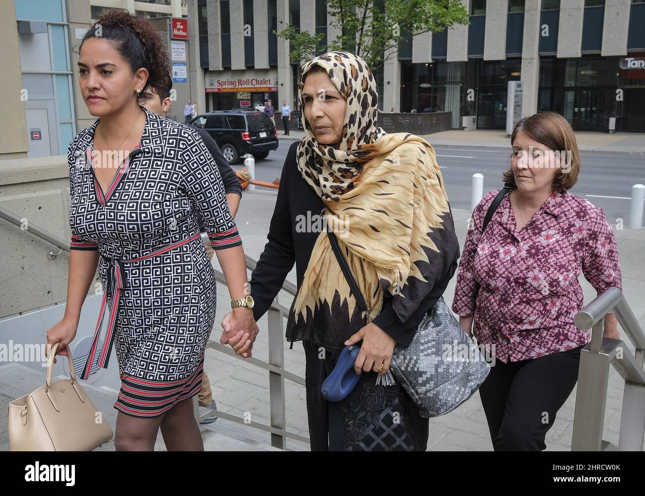 Kobra Mohammadi, centre, mother of Maryam Rashidi, arrives at court ...