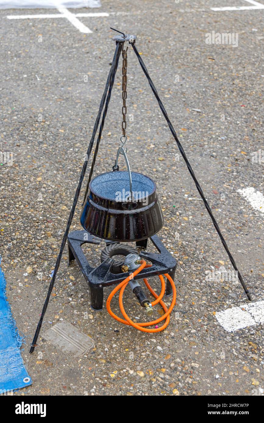 Outdoor Cooking Pot With Tripod Gas Burner Hose Stock Photo - Alamy