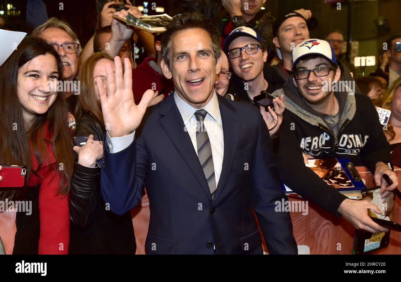 Ben Stiller poses for a photo with fans as he arrives on the red carpet ...