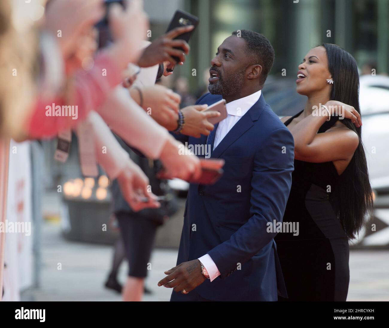 Idris Elba and Sabrina Dhowre arrive on the red carpet for the premiere ...