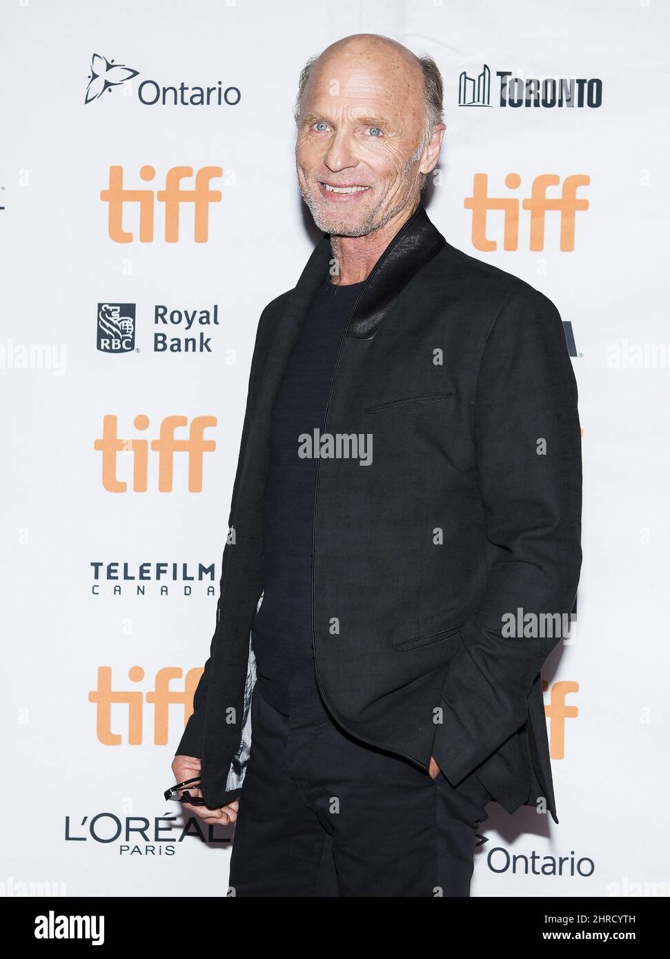 Actor Ed Harris poses for photographs on the red carpet as he arrives ...