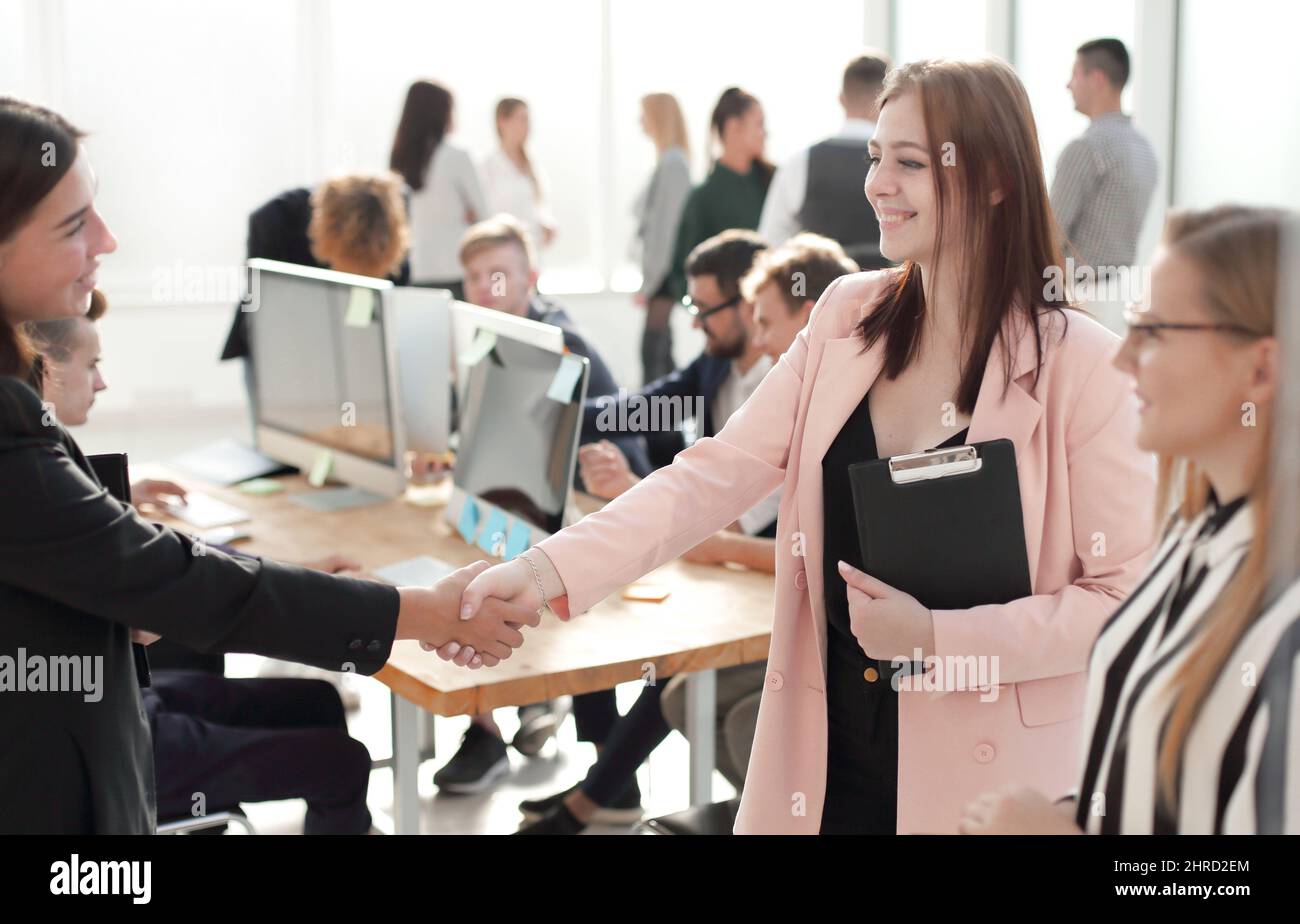 close up. happy employees discussing financial schedules Stock Photo ...