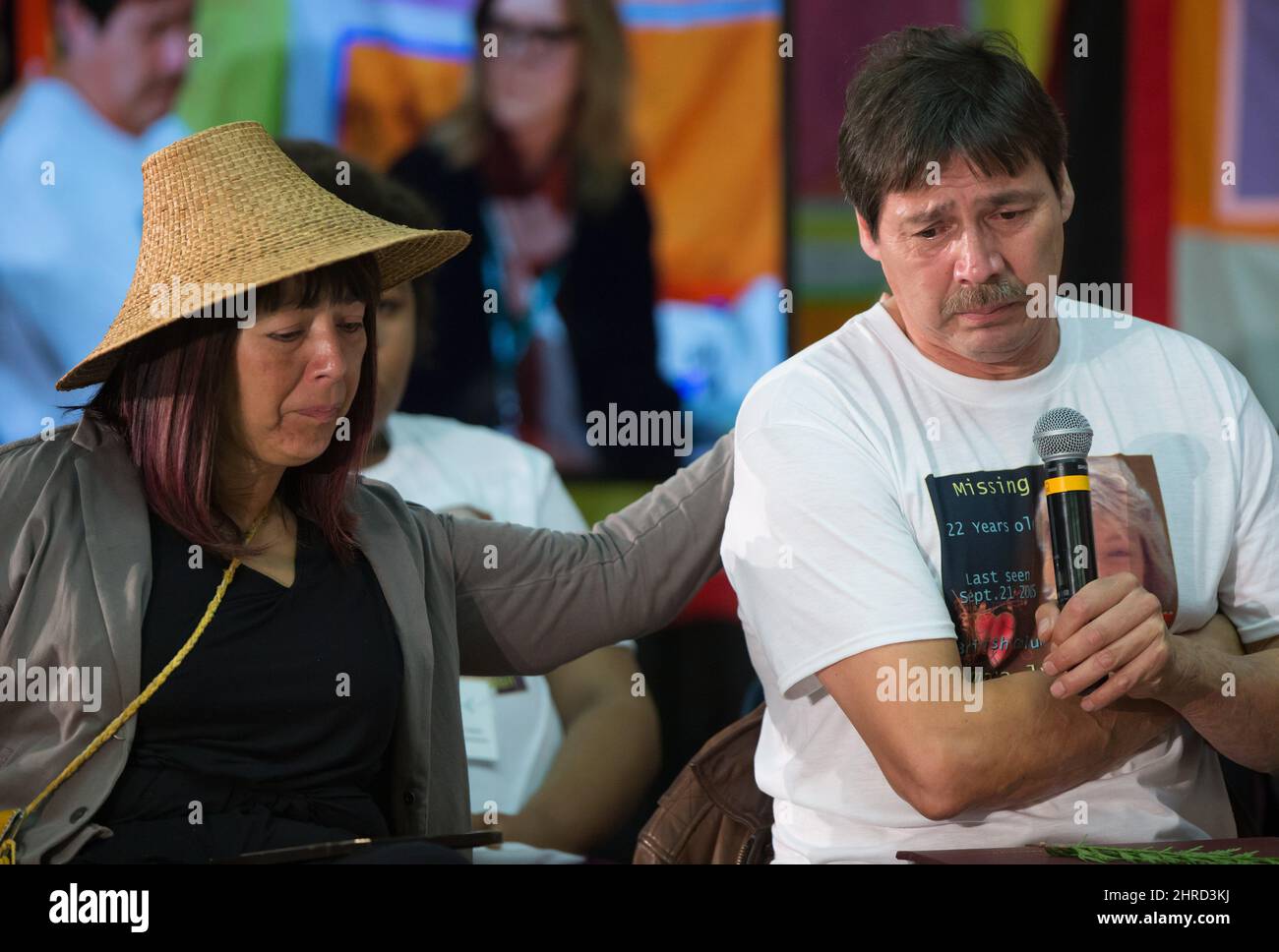 Tom Chipman, right, is comforted by his sister Lorna Brown as he pauses ...