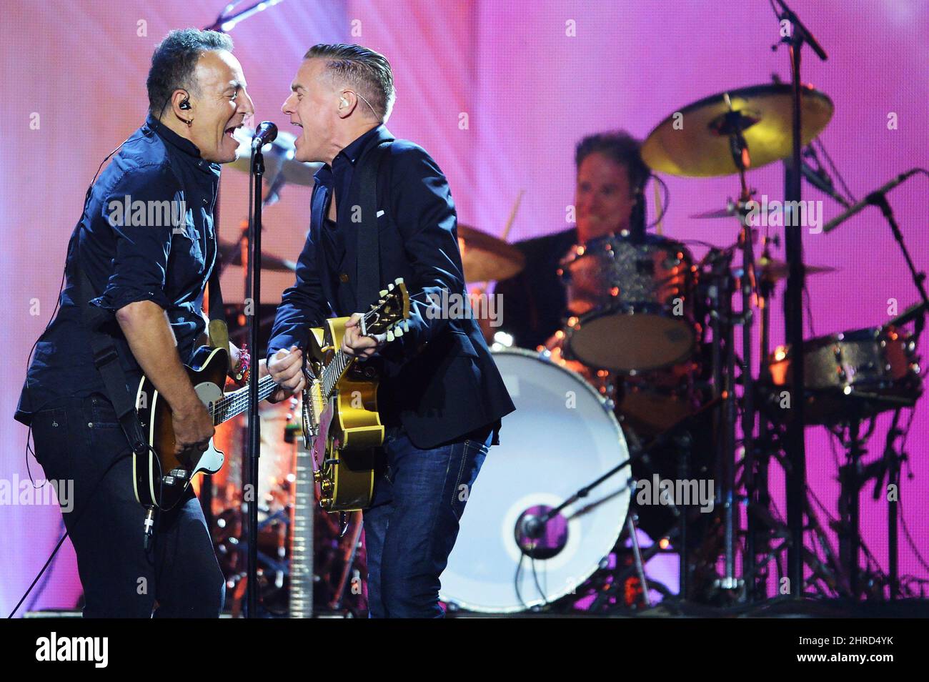 Bruce Springsteen and Bryan Adams perform during the closing ceremonies ...