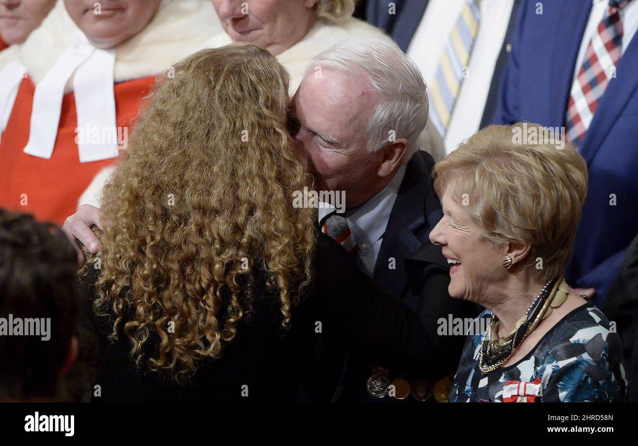 Governor General Designate Julie Payette, left, embraces outgoing Governor General David ...