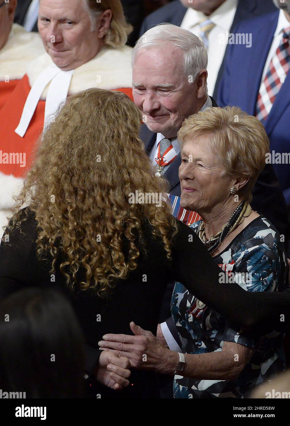 Governor General Designate Julie Payette, left, embraces outgoing Governor General David ...