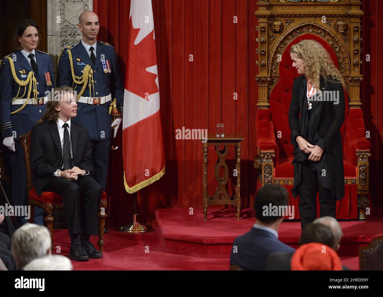 Julie Payette looks to her son Laurier as she makes her first speech as Canada's 29th Governor ...