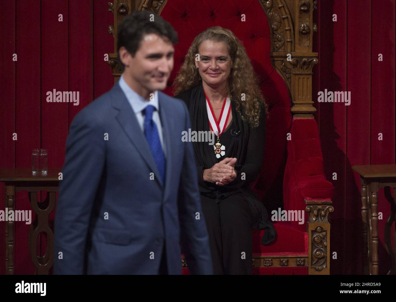 Prime Minister Justin Trudeau walks past Canada's 29th Governor General Julie Payette following ...