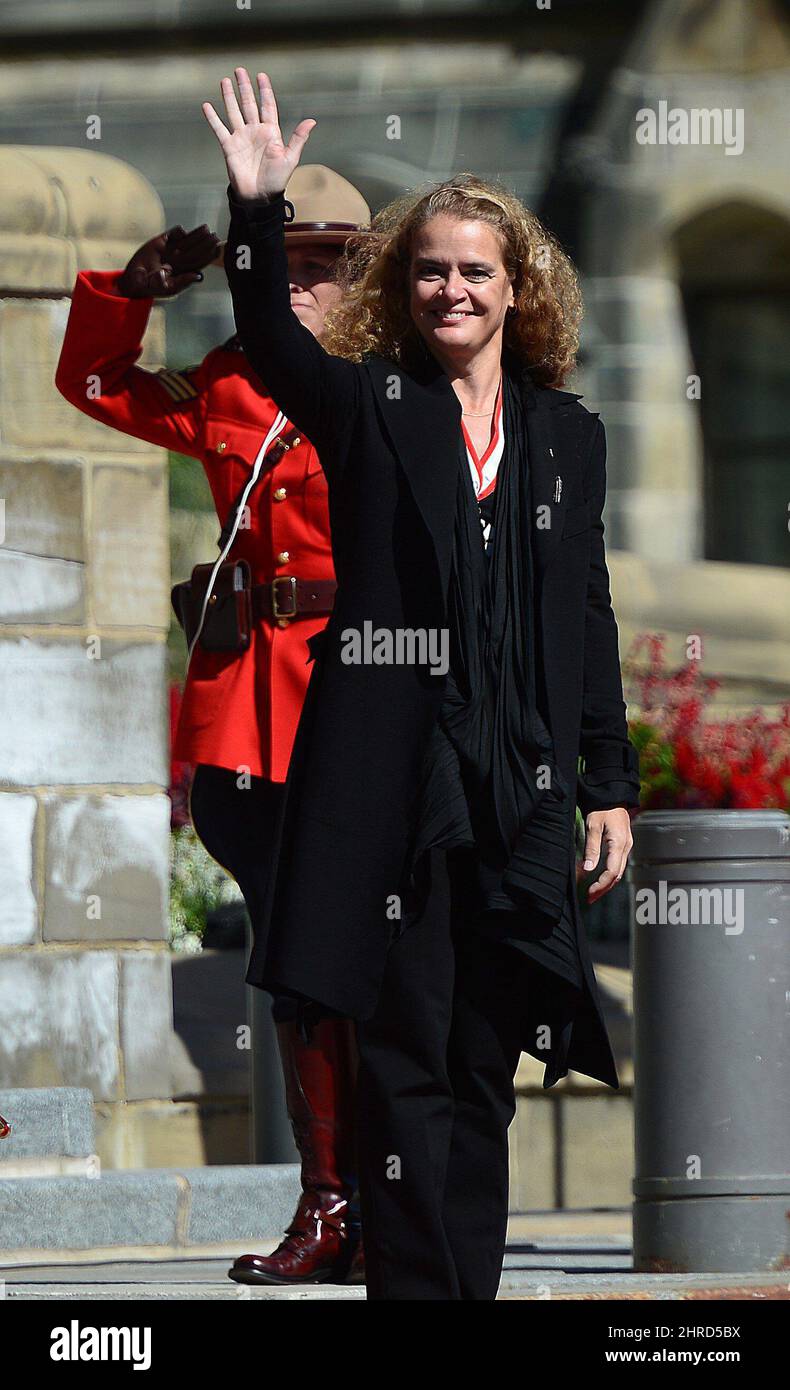 Canada's 29th Governor General Julie Payette waves to onlookers as she receives a salute from an ...