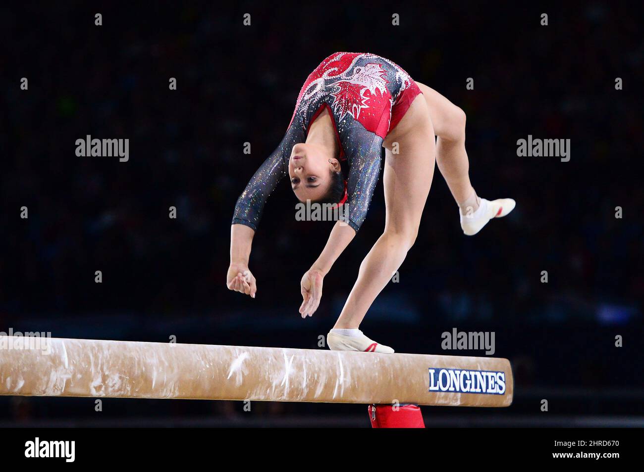 Brooklyn Moors of Canada competes in the balance beam event of the ...