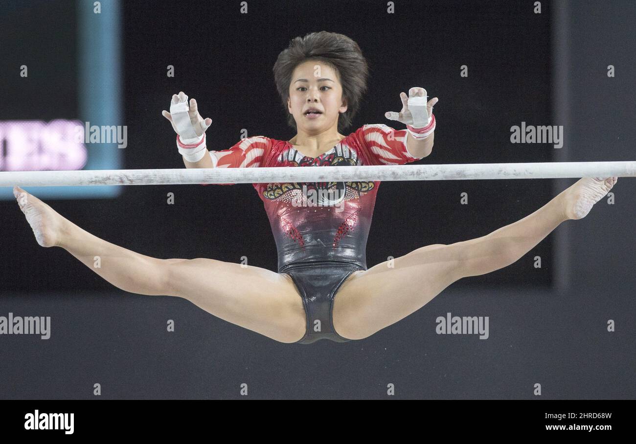 Mai Murakami of Japan performs on the uneven bars during the Women's ...