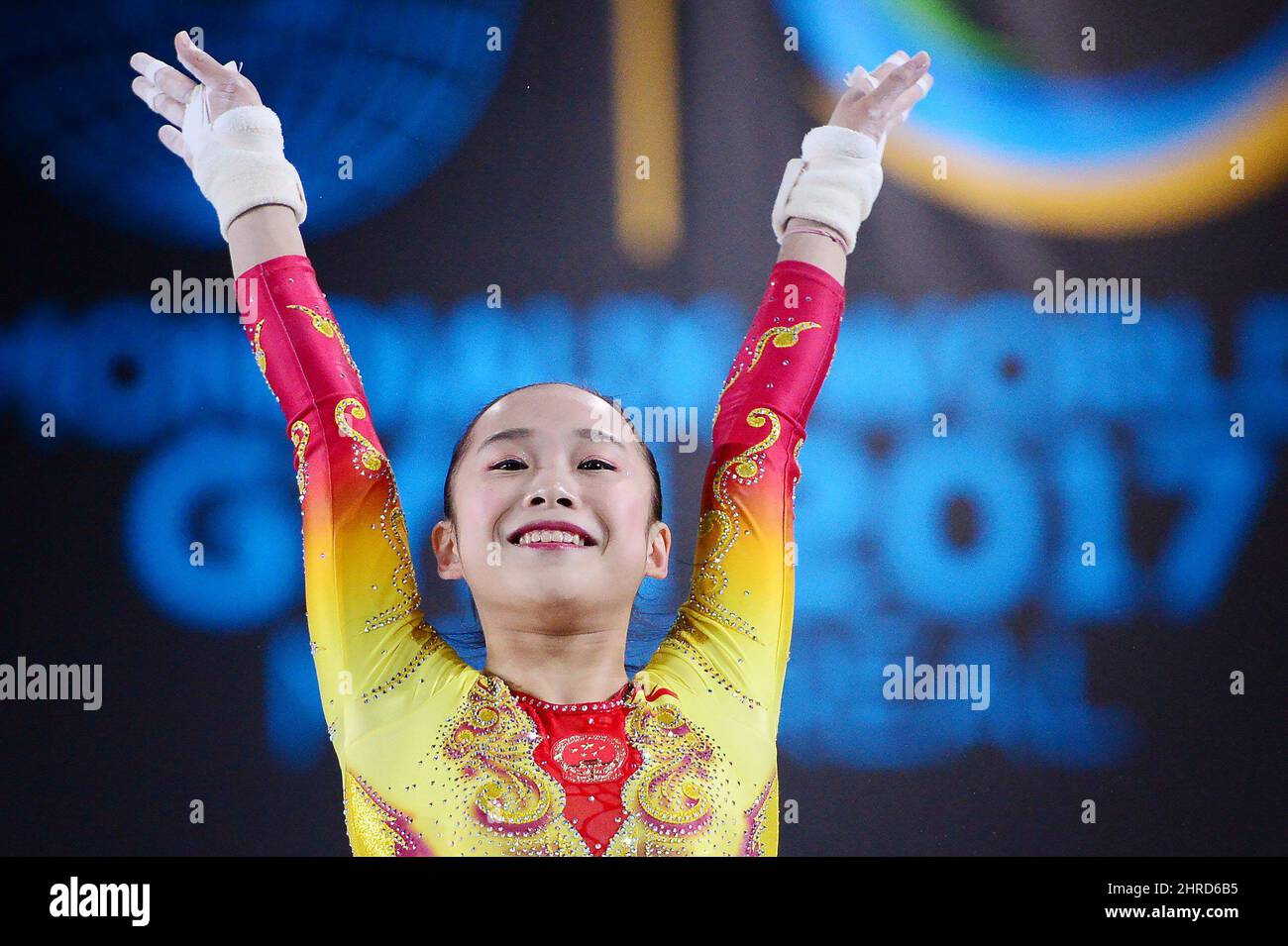 Fan Yilin, of China, reacts after performing in the uneven bars event ...