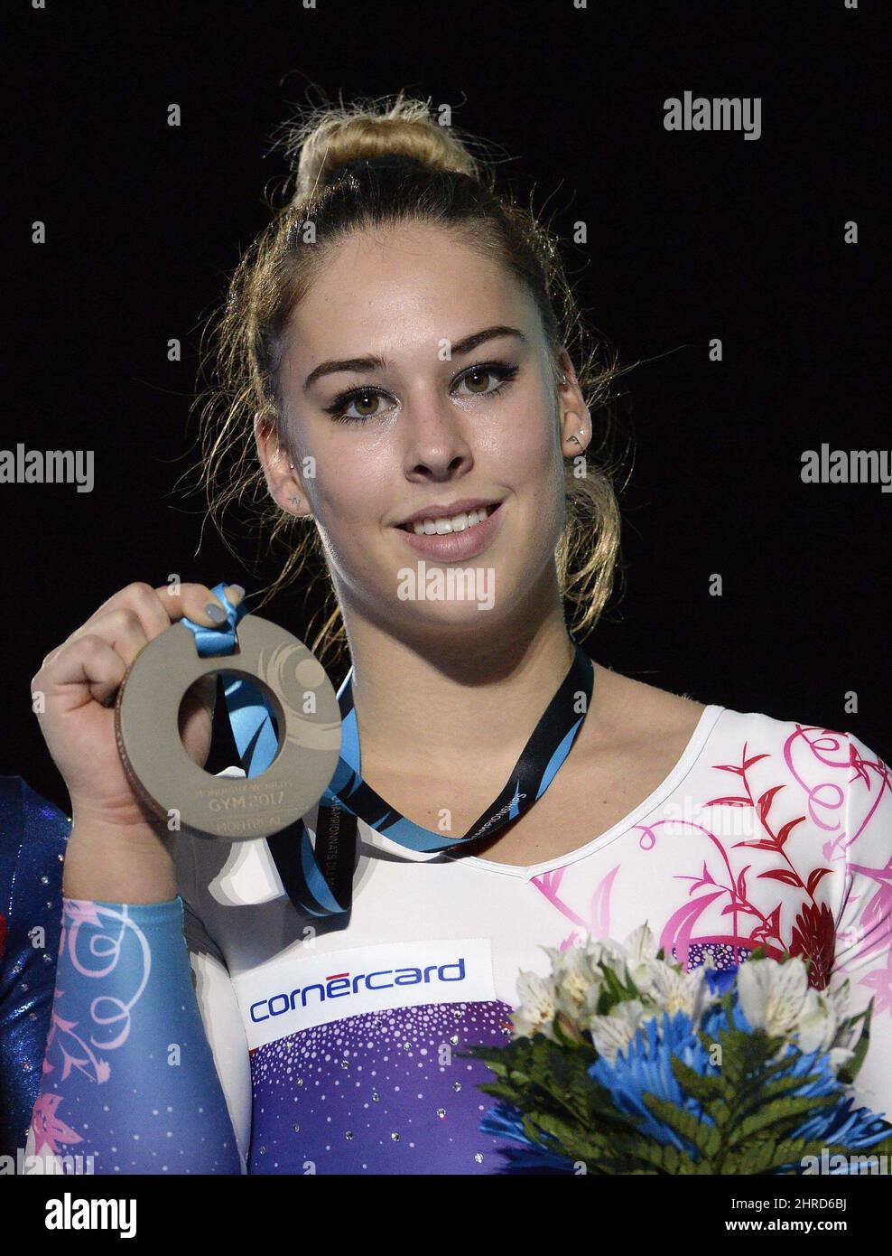 Giulia Steingruber, of Switzerland, poses with her medal after winning ...