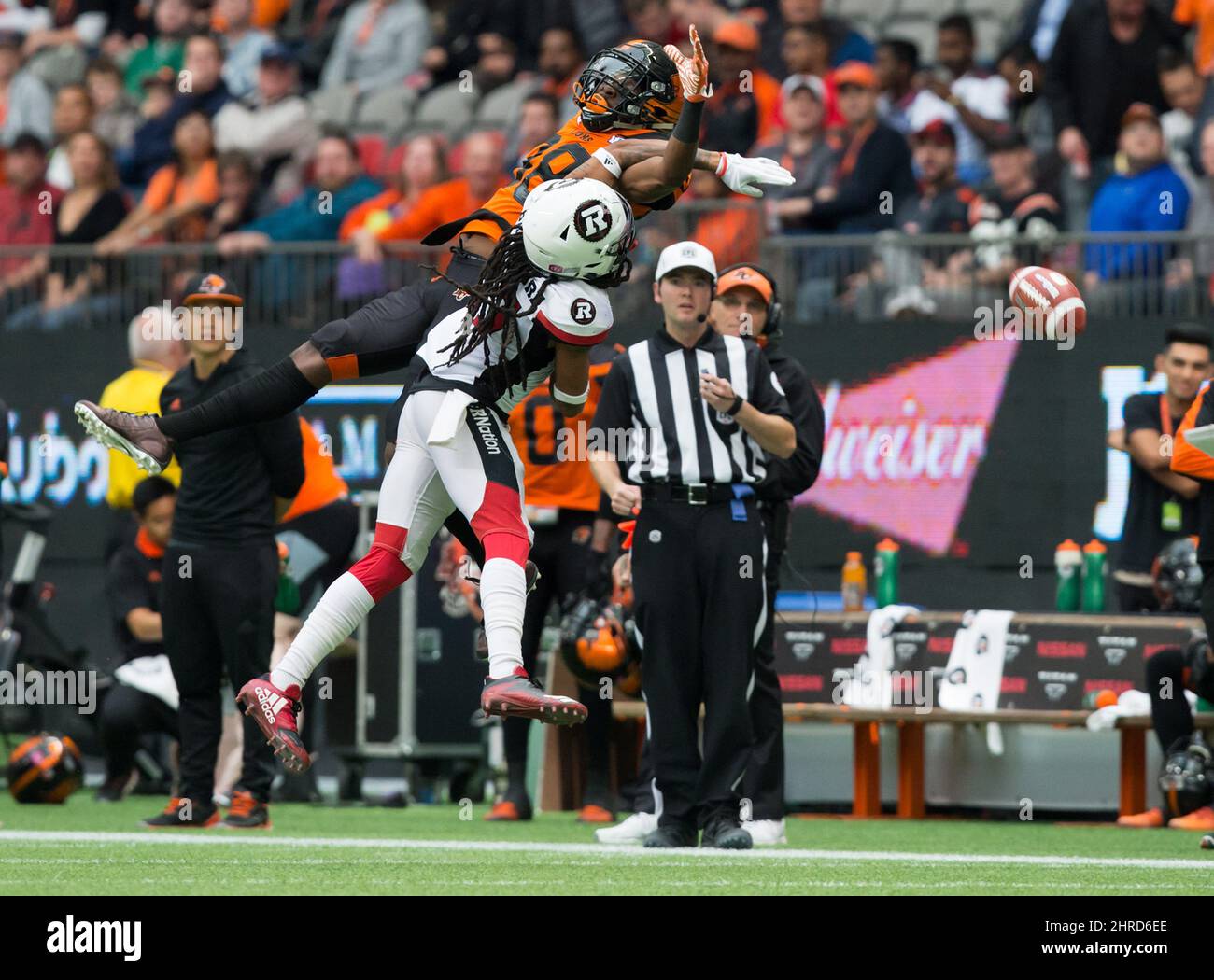 B.C. Lions' Shaq Johnson, back, fails to make the reception as Ottawa ...