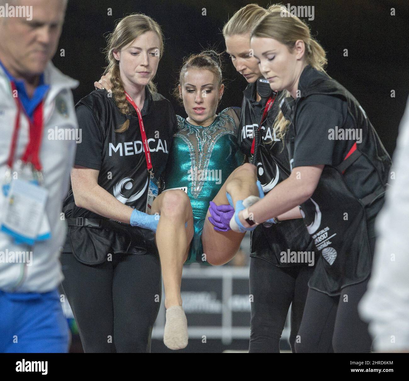 Vanessa Ferrari, of Italy, is carried of the floor after injuring her ...