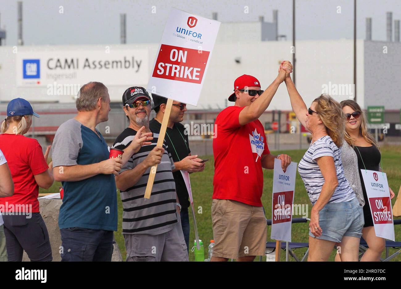 Employees of the GM CAMI assembly factory stand on the picket line in ...