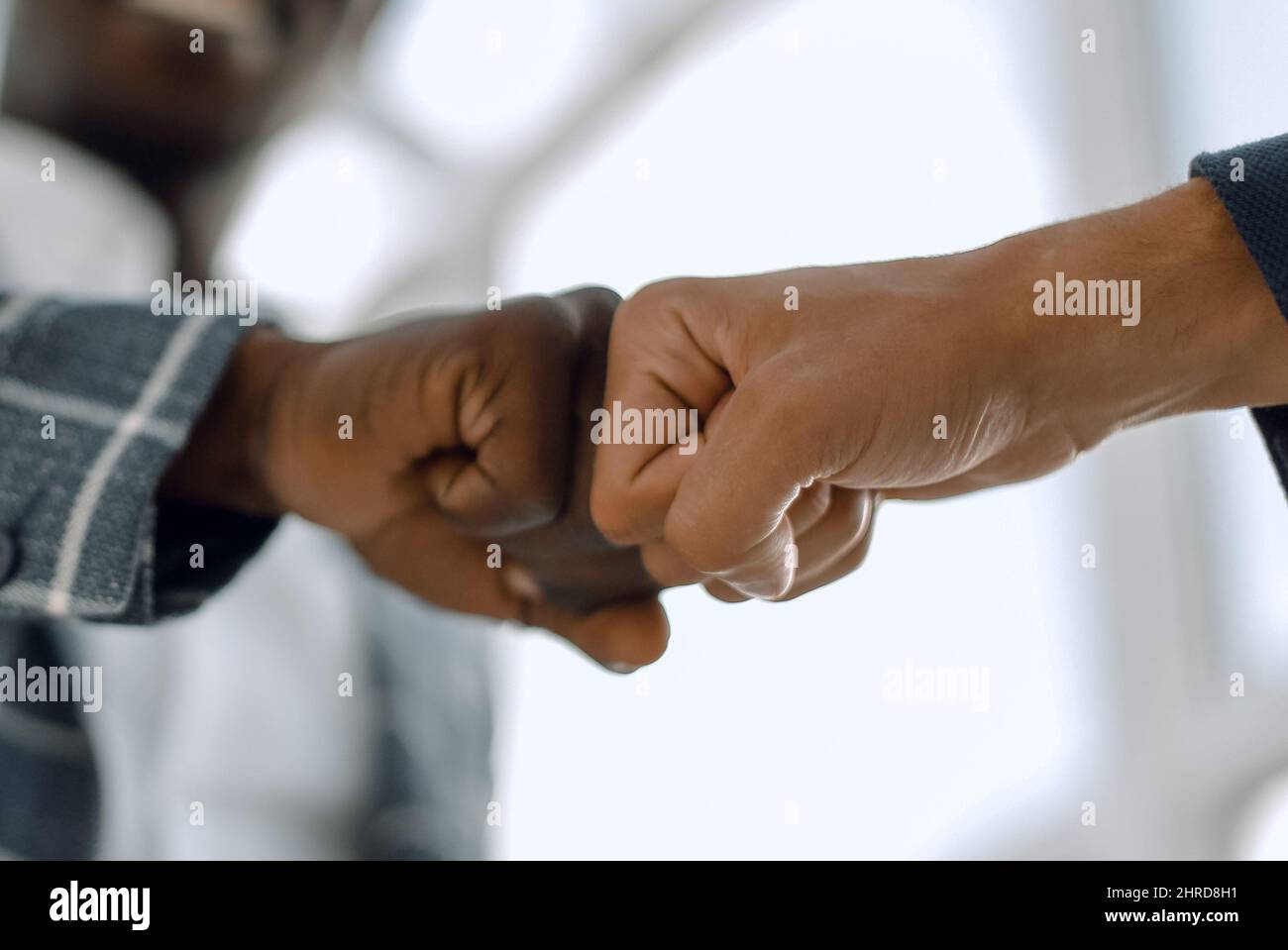 Business people showing Fist Bump after meeting Stock Photo - Alamy