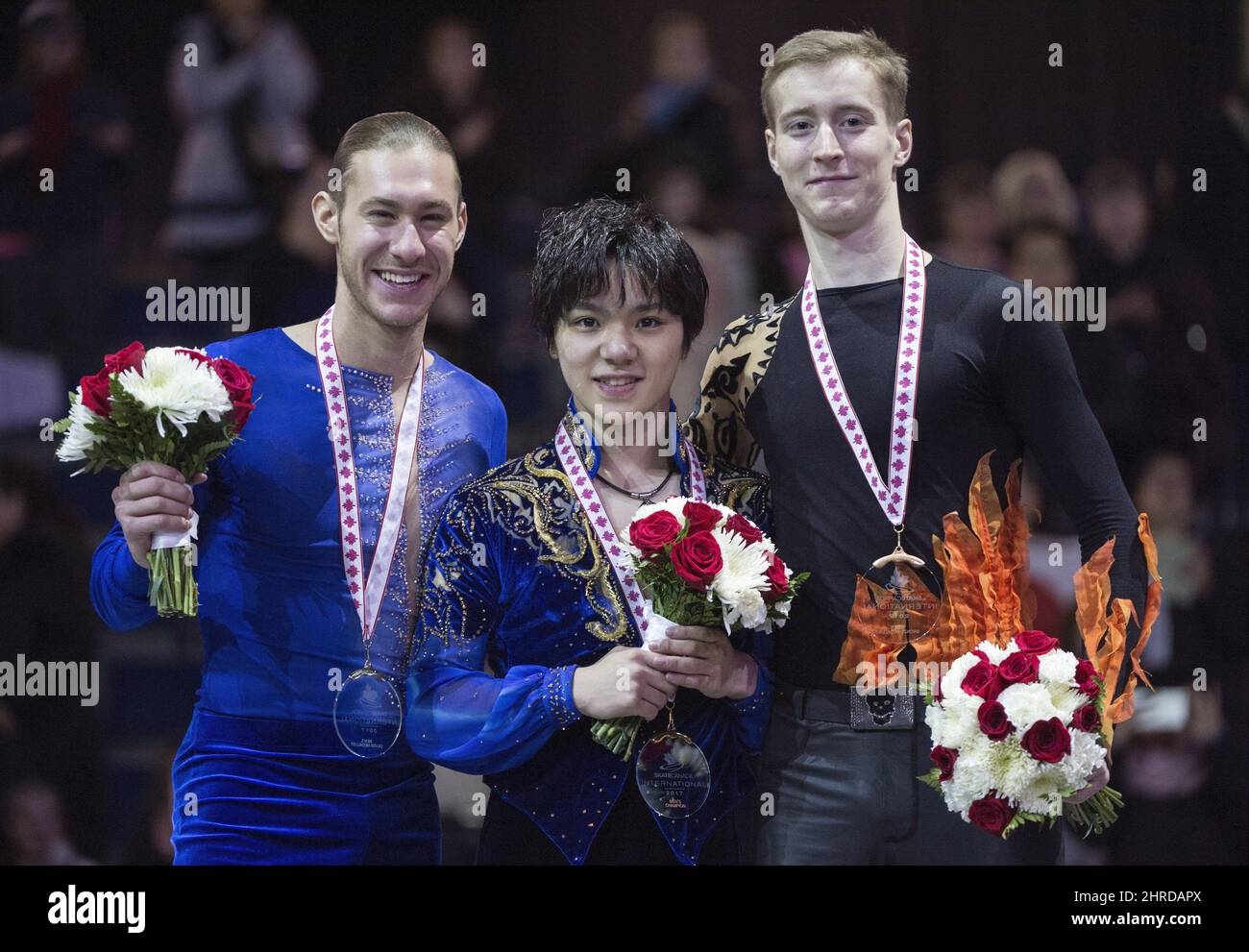 Men's gold medalist Shoma Uno, centre, of Japan, silver medalist Jason ...