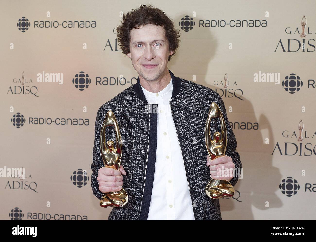 Patrice Michaud holds up his trophies at gala Adisq awards ceremony in ...