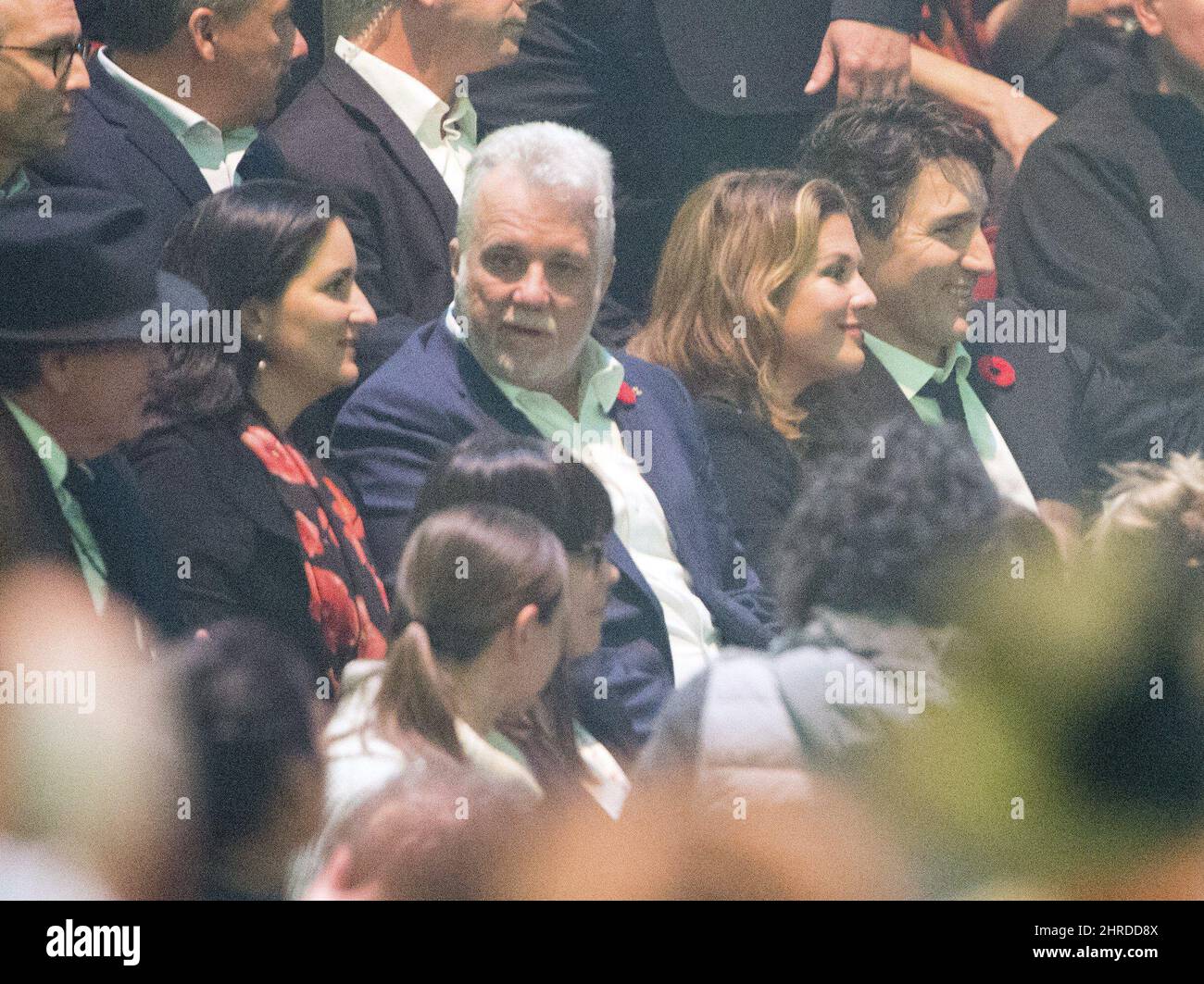 Quebec Premier Philippe Couillard, centre, Prime Minister Justin ...