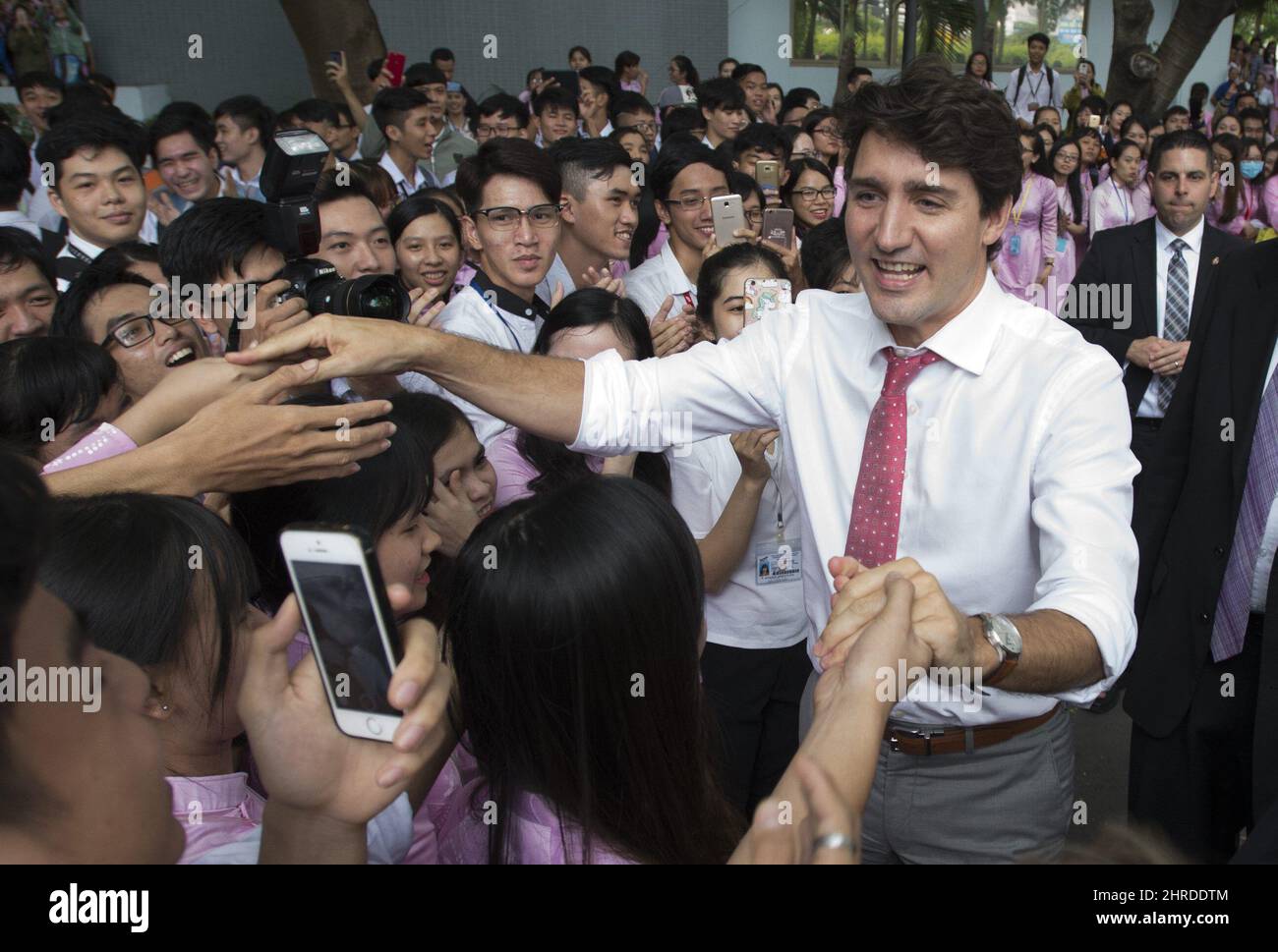 Canadian Prime Minister Justin Trudeau is greeted by students at the ...