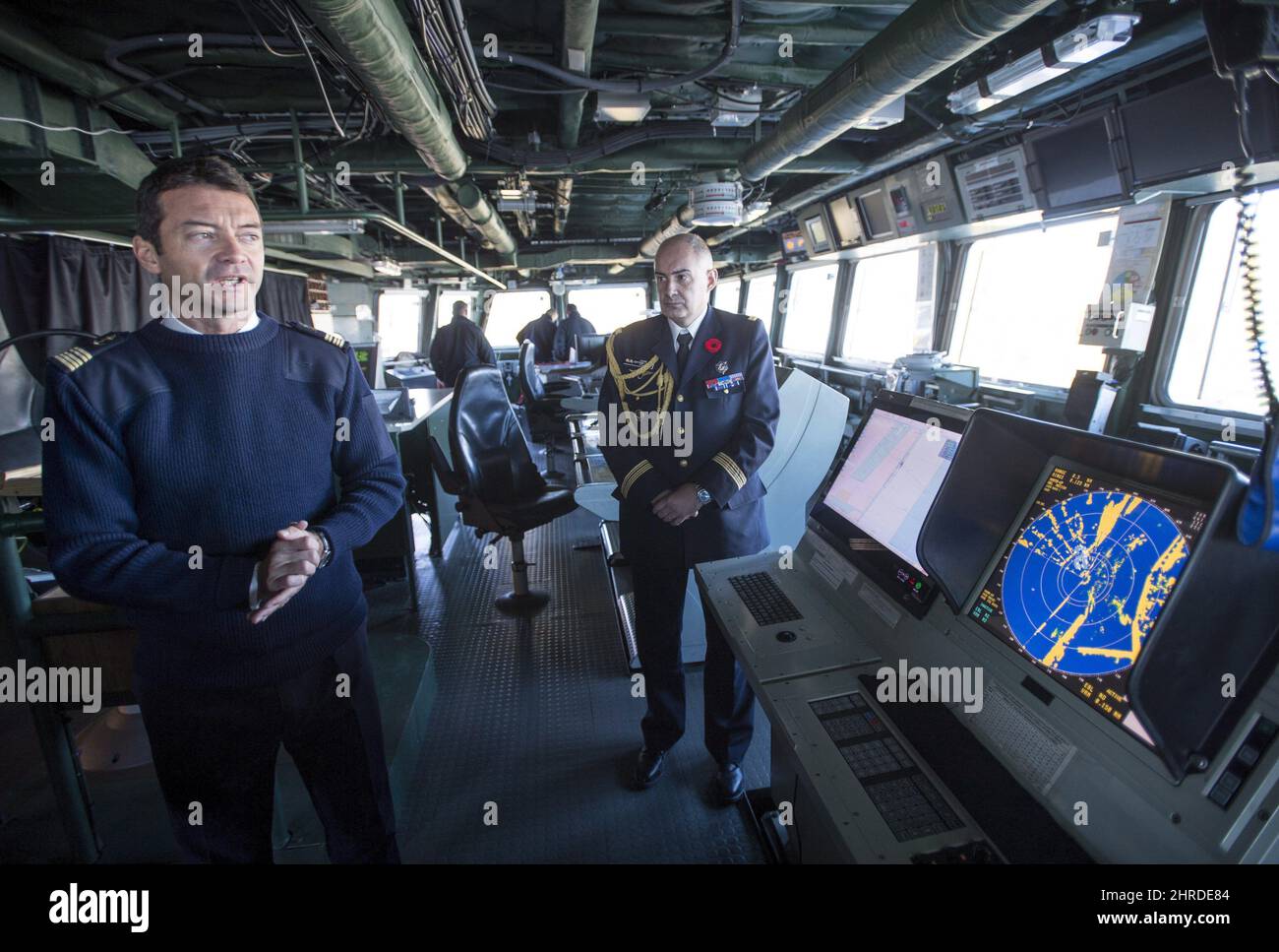 Thomas Fraioli, ship captain of the FS Forbin, stands on its bridge ...