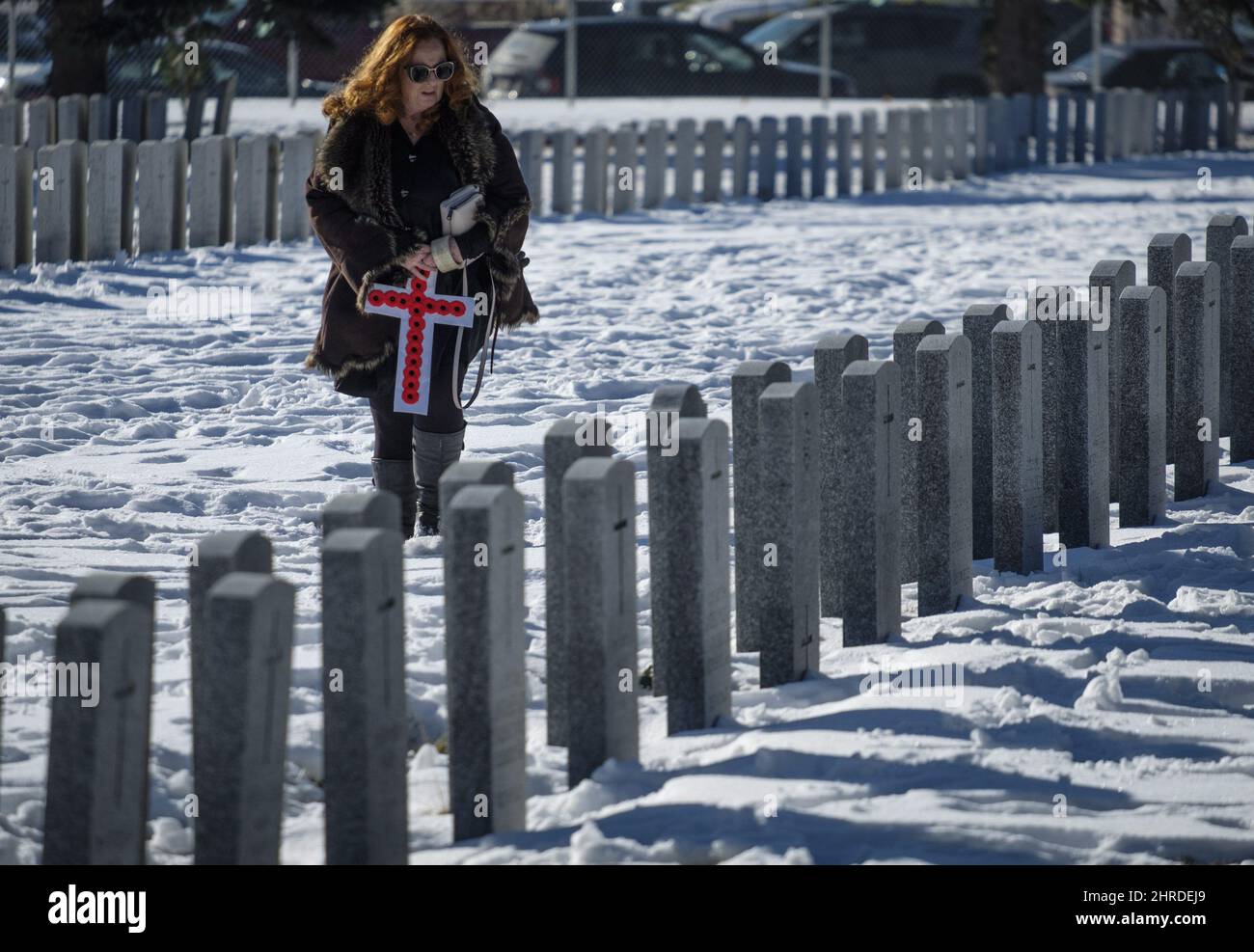 Lyn Moehling looks for the grave marker of her grandfather, WWI veteran ...