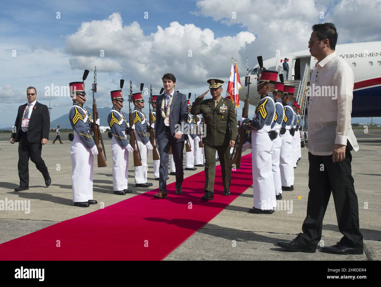 Canadian Prime Minister Justin Trudeau walks through an honour guard as ...