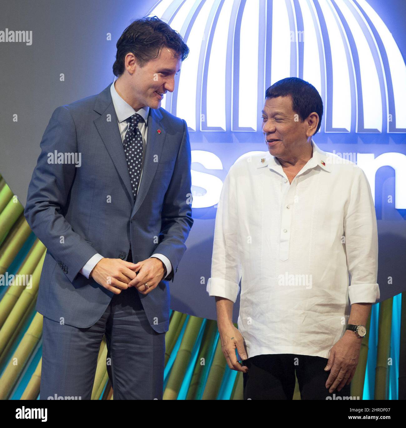 Canadian Prime Minister Justin Trudeau, left, speaks with Philippines ...
