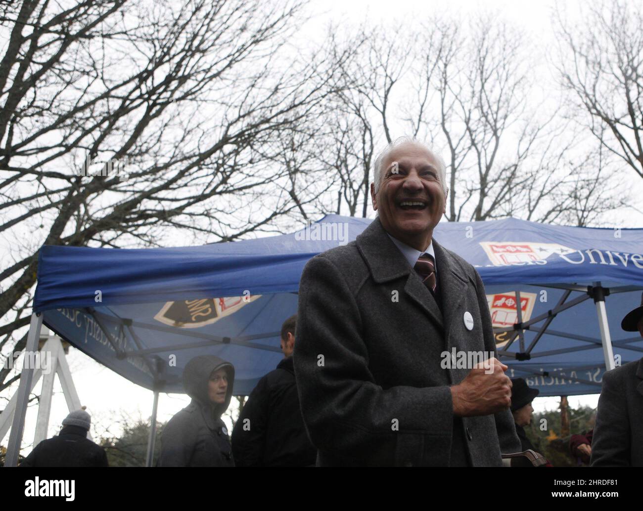 Manjit Virk greets a friend following a memorial marking 20 years since ...