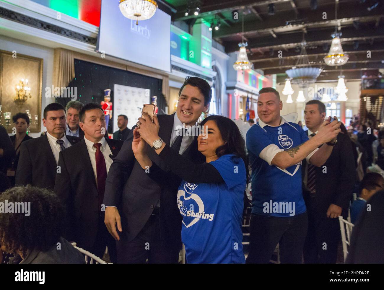 Prime Minister Justin Trudeau takes selfies with people at the Caring ...