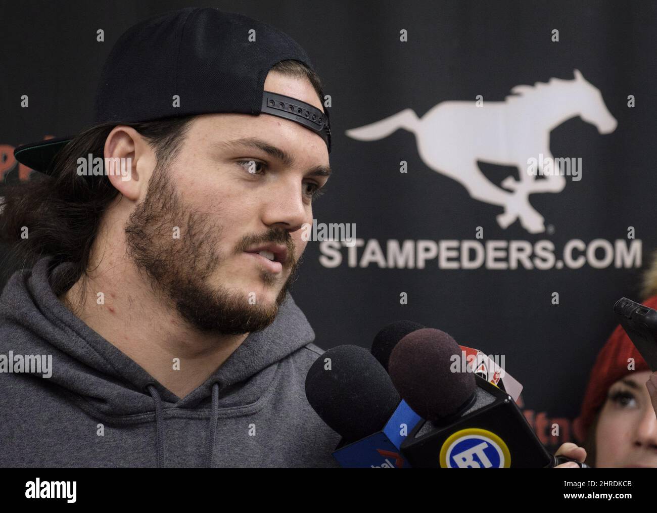 Calgary Stampeders' Alex Singleton speaks to reporters at the team's ...