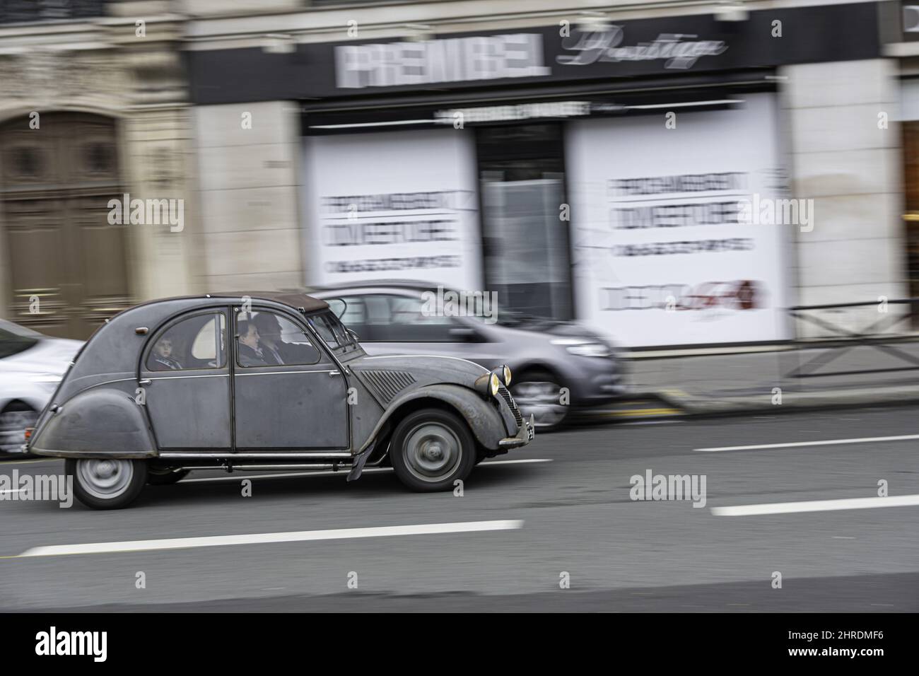 Classic gray colored Citroen 2CV car driving on the street Stock Photo ...