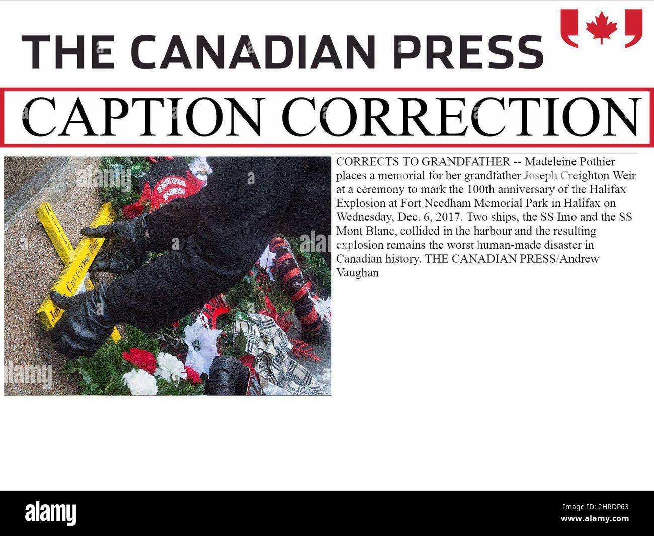 CORRECTS TO GRANDFATHER -- Madeleine Pothier places a memorial for her ...