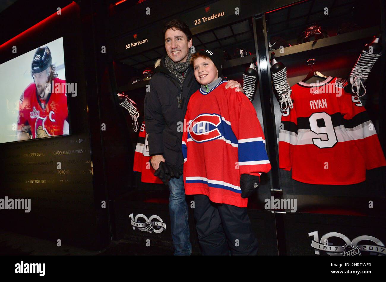 Prime Minister Justin Trudeau takes in the pavillions with his son ...