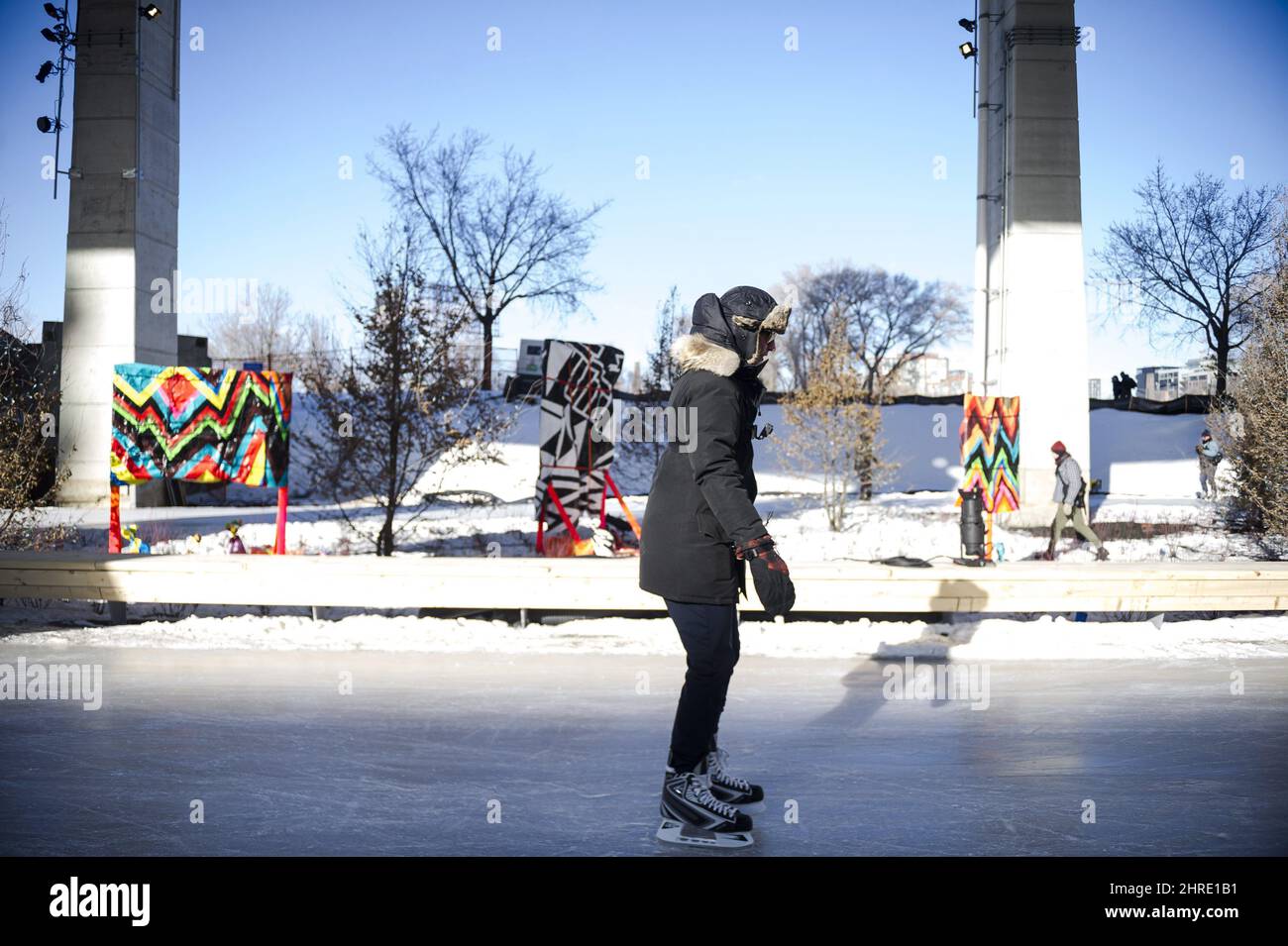 Members of the local community skate in a media preview of the Bentway ...