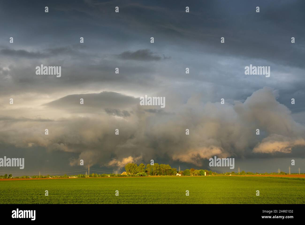 Massive clouds over houses hi-res stock photography and images - Alamy