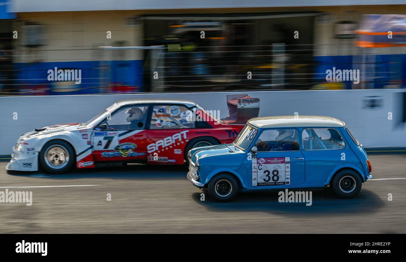Mini vs big car Stock Photo - Alamy